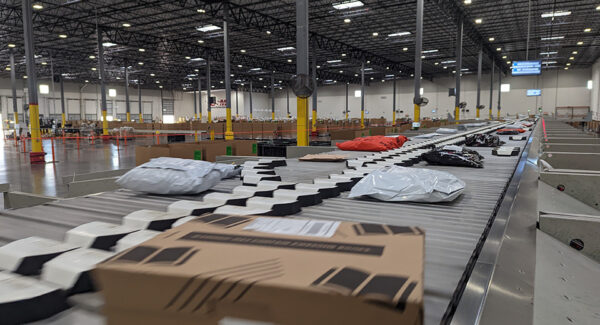 Parcel Sorting Systems for Warehouse Distribution | NPI